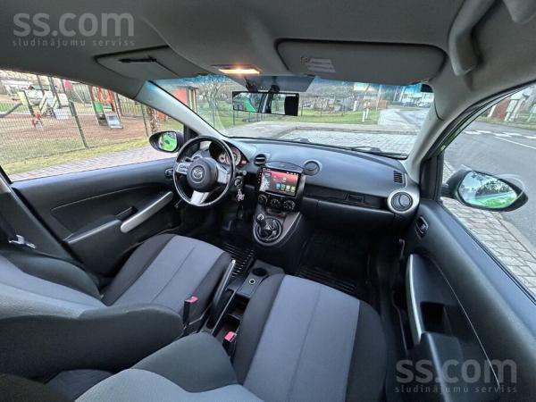 Green Mazda 2 2009 in Riga, with an engine capacity of 1.40 L and mileage of 154 thousand km for 1970 €, photo 9 on AUTOMOTO.COM.LV