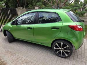 Green Mazda 2 2010 in Vilnius, with an engine capacity of 1.35 L and mileage of 139 thousand km for 1950 €, photo 4 on AUTOMOTO.COM.LV