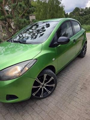 Green Mazda 2 2010 in Vilnius, with an engine capacity of 1.35 L and mileage of 139 thousand km for 1950 €, photo 6 on AUTOMOTO.COM.LV