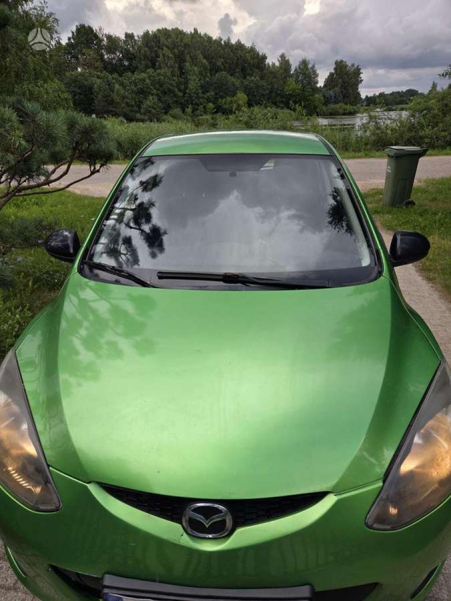 Green Mazda 2 2010 in Vilnius, with an engine capacity of 1.35 L and mileage of 139 thousand km for 1950 €, photo 7 on AUTOMOTO.COM.LV