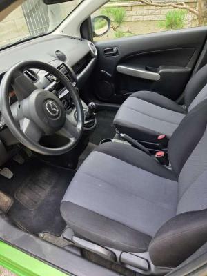 Green Mazda 2 2010 in Vilnius, with an engine capacity of 1.35 L and mileage of 139 thousand km for 1950 €, photo 9 on AUTOMOTO.COM.LV