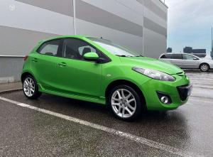 Green Mazda 2 2013 in Vilnius, with an engine capacity of 1.56 L and mileage of 260 thousand km for 3290 €, photo 4 on AUTOMOTO.COM.LV