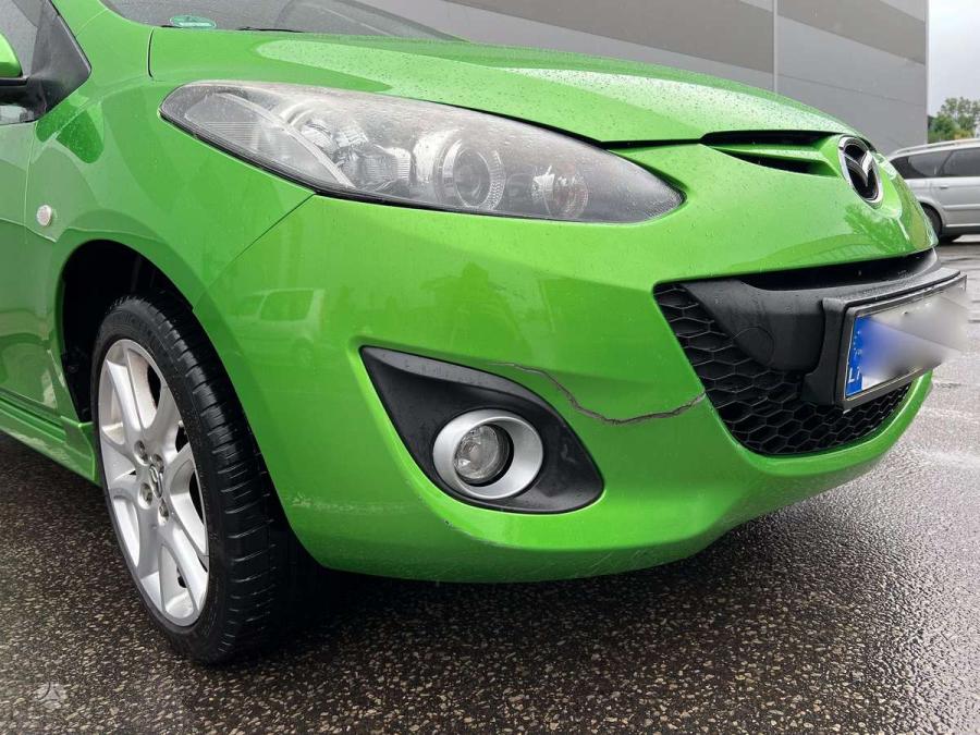 Green Mazda 2 2013 in Vilnius, with an engine capacity of 1.56 L and mileage of 260 thousand km for 3290 €, photo 5 on AUTOMOTO.COM.LV