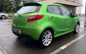 Green Mazda 2 2013 in Vilnius, with an engine capacity of 1.56 L and mileage of 260 thousand km for 3290 €, photo 6 on AUTOMOTO.COM.LV