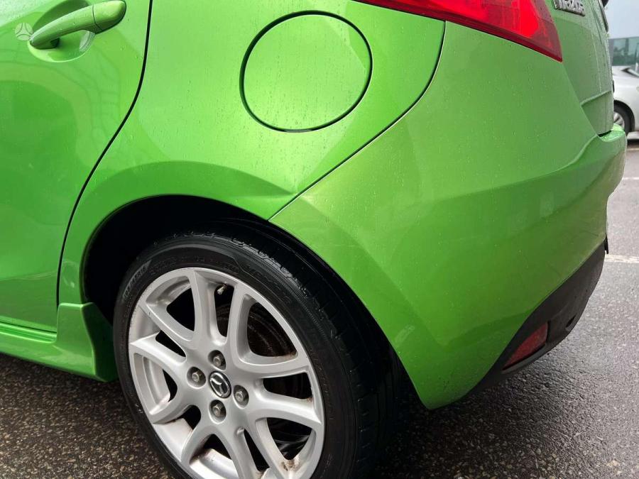 Green Mazda 2 2013 in Vilnius, with an engine capacity of 1.56 L and mileage of 260 thousand km for 3290 €, photo 7 on AUTOMOTO.COM.LV