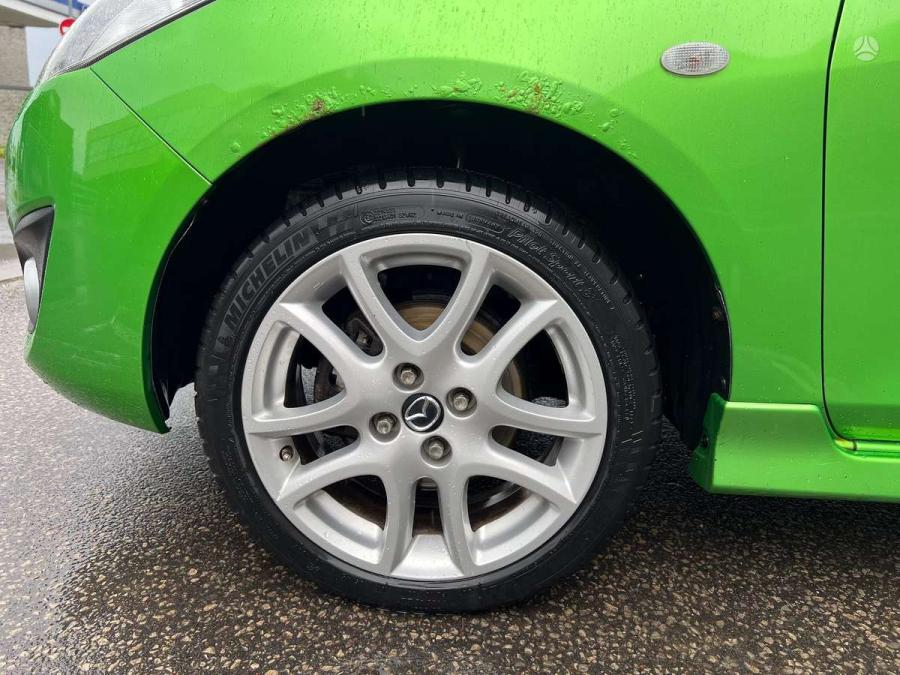 Green Mazda 2 2013 in Vilnius, with an engine capacity of 1.56 L and mileage of 260 thousand km for 3290 €, photo 8 on AUTOMOTO.COM.LV