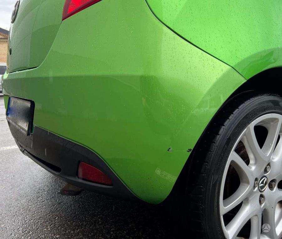 Green Mazda 2 2013 in Vilnius, with an engine capacity of 1.56 L and mileage of 260 thousand km for 3290 €, photo 10 on AUTOMOTO.COM.LV