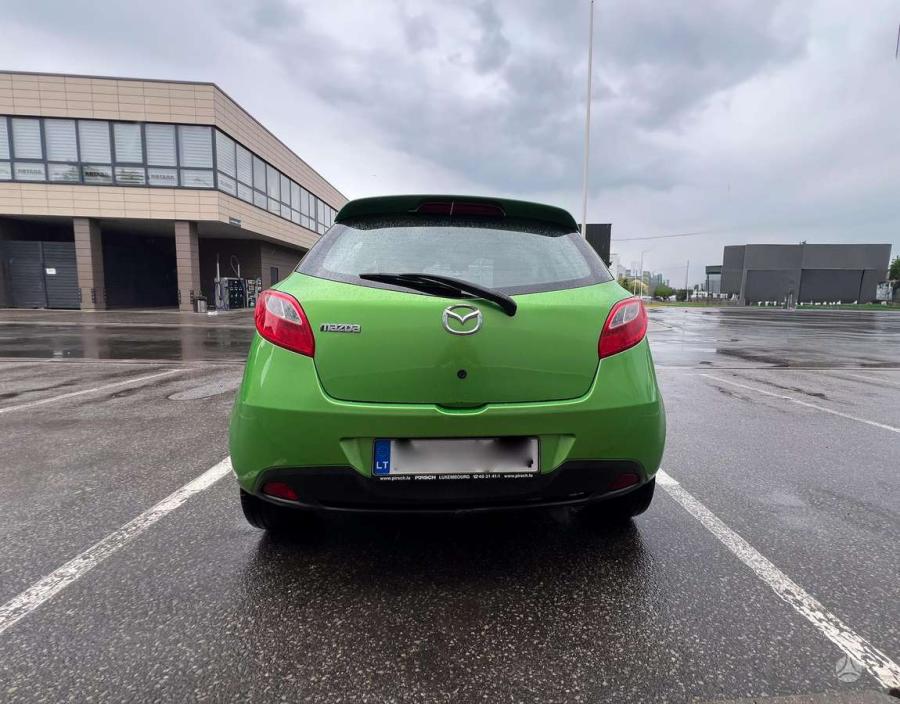 Green Mazda 2 2013 in Vilnius, with an engine capacity of 1.56 L and mileage of 260 thousand km for 3290 €, photo 11 on AUTOMOTO.COM.LV