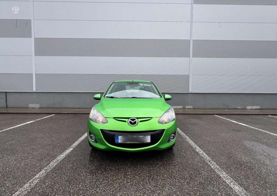 Green Mazda 2 2013 in Vilnius, with an engine capacity of 1.56 L and mileage of 260 thousand km for 3290 €, photo 13 on AUTOMOTO.COM.LV