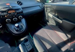 Green Mazda 2 2013 in Vilnius, with an engine capacity of 1.56 L and mileage of 260 thousand km for 3290 €, photo 18 on AUTOMOTO.COM.LV
