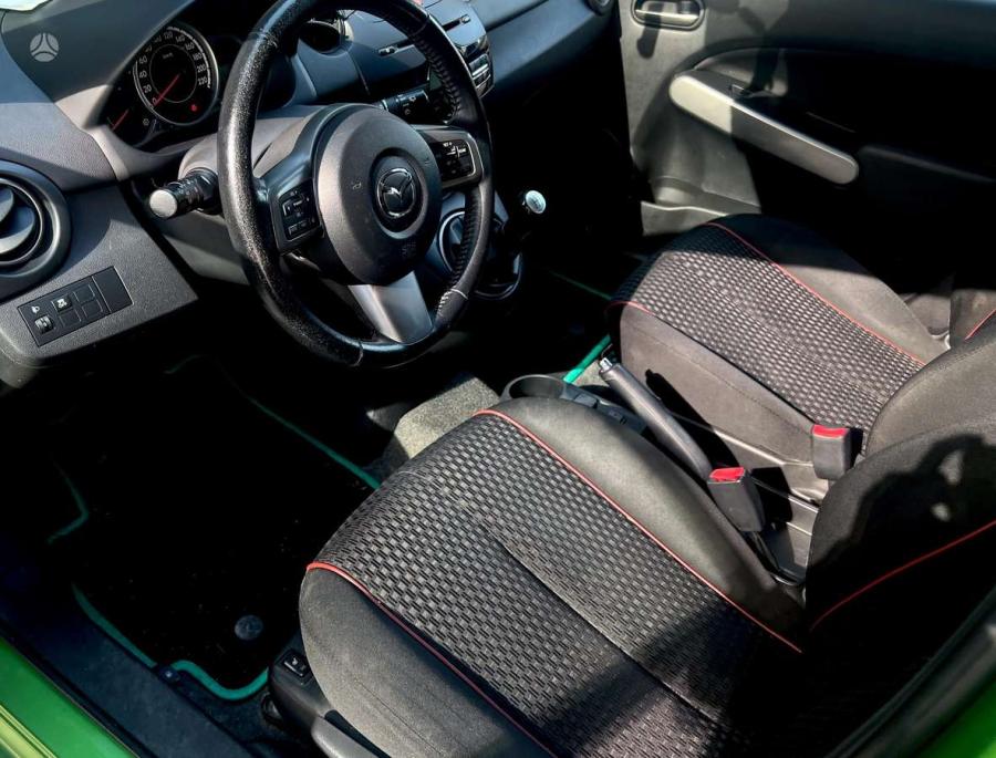 Green Mazda 2 2013 in Vilnius, with an engine capacity of 1.56 L and mileage of 260 thousand km for 3290 €, photo 21 on AUTOMOTO.COM.LV