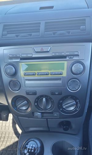 Pelēks Mazda 2 2003 Rīga, ar dzinēja tilpumu 1.40 L un nobraukumu 299 tūkst. km par 1100 €, foto 12 vietnē AUTOMOTO.COM.LV