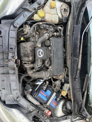 Grey Mazda 2 2004 in Vilnius, with an engine capacity of 1.40 L and mileage of 250 thousand km for 1650 €, photo 18 on AUTOMOTO.COM.LV