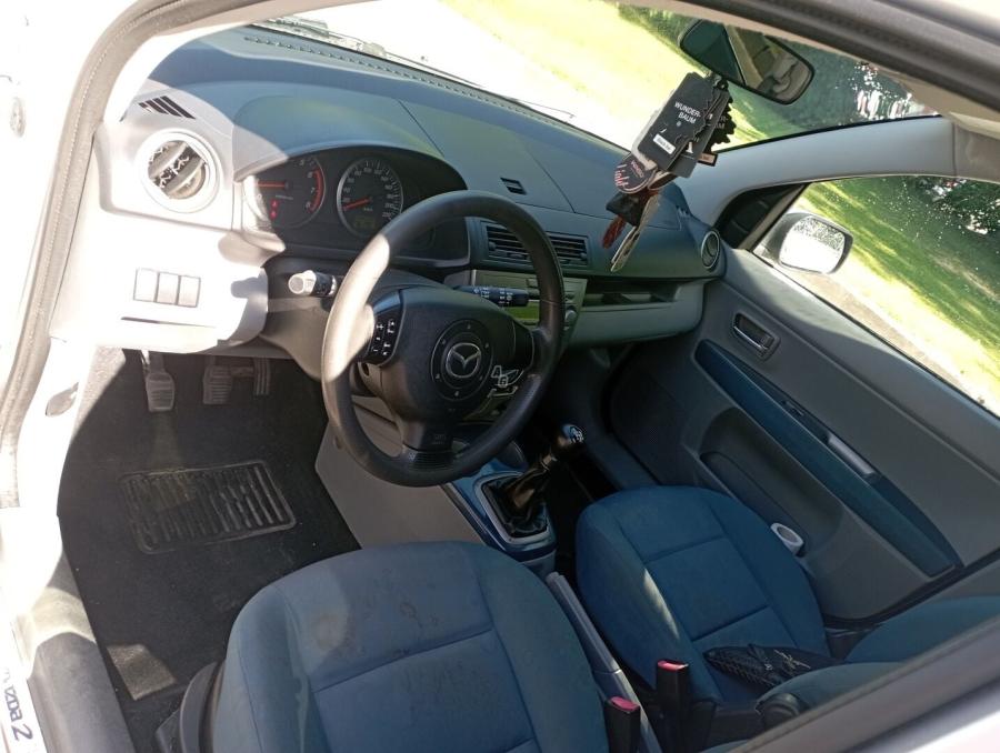Grey Mazda 2 2004 in Vilnius, with an engine capacity of 1.40 L and mileage of 300 thousand km for 400 €, photo 18 on AUTOMOTO.COM.LV