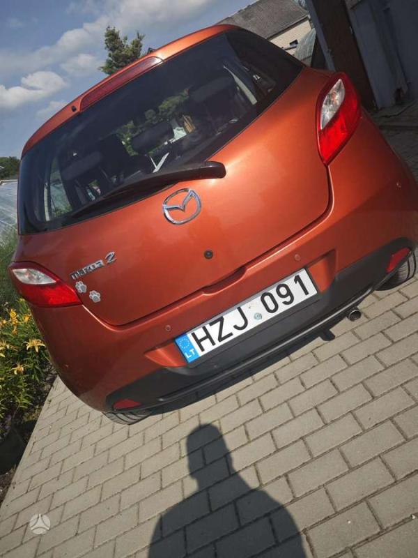 Oranžs Mazda 2 2009 Kauņa, ar dzinēja tilpumu 1.35 L un nobraukumu 170 tūkst. km par 1400 €, foto 3 vietnē AUTOMOTO.COM.LV