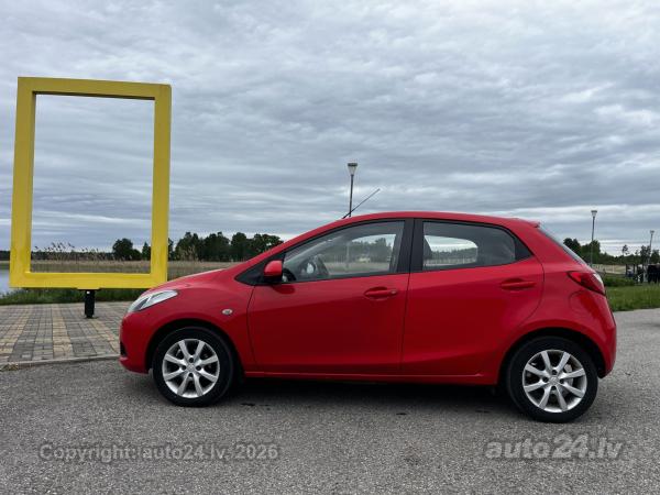 Red Mazda 2 2008 in Voru, with an engine capacity of 1.30 L and mileage of 198 thousand km for 1499 €, photo 2 on AUTOMOTO.COM.LV