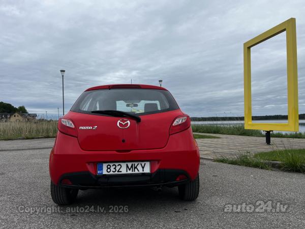 Red Mazda 2 2008 in Voru, with an engine capacity of 1.30 L and mileage of 198 thousand km for 1499 €, photo 8 on AUTOMOTO.COM.LV