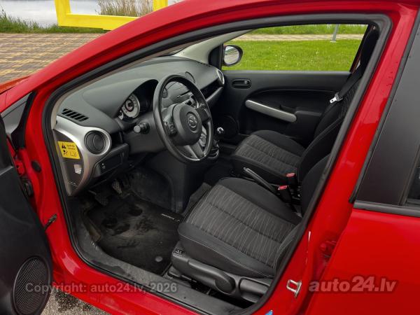 Red Mazda 2 2008 in Voru, with an engine capacity of 1.30 L and mileage of 198 thousand km for 1499 €, photo 9 on AUTOMOTO.COM.LV