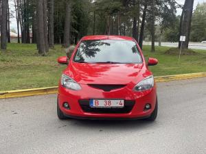 Red Mazda 2 2008 in Riga, with an engine capacity of 1.40 L and mileage of 152 thousand km for 2790 €, photo 4 on AUTOMOTO.COM.LV