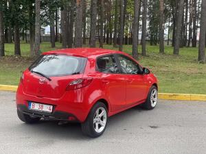 Red Mazda 2 2008 in Riga, with an engine capacity of 1.40 L and mileage of 152 thousand km for 2790 €, photo 5 on AUTOMOTO.COM.LV