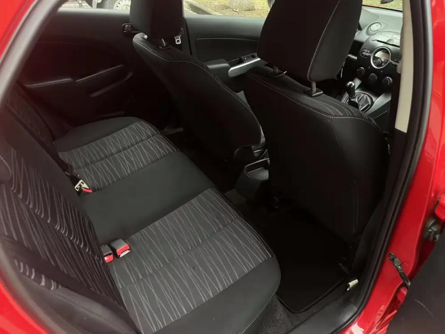Red Mazda 2 2008 in Riga, with an engine capacity of 1.40 L and mileage of 152 thousand km for 2790 €, photo 9 on AUTOMOTO.COM.LV