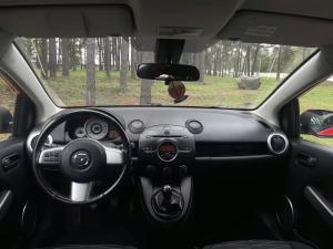Red Mazda 2 2008 in Riga, with an engine capacity of 1.40 L and mileage of 152 thousand km for 2790 €, photo 12 on AUTOMOTO.COM.LV