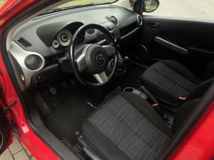 Red Mazda 2 2008 in Riga, with an engine capacity of 1.40 L and mileage of 152 thousand km for 2790 €, photo 13 on AUTOMOTO.COM.LV