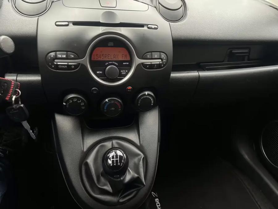 Red Mazda 2 2008 in Riga, with an engine capacity of 1.40 L and mileage of 152 thousand km for 2790 €, photo 16 on AUTOMOTO.COM.LV