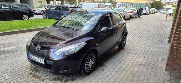Sarkans Mazda 2 2009 Viļņa, ar dzinēja tilpumu 1.35 L un nobraukumu 320 tūkst. km par 499 €, foto 1 vietnē AUTOMOTO.COM.LV
