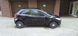 Red Mazda 2 2009 in Vilnius, with an engine capacity of 1.35 L and mileage of 320 thousand km for 499 €, photo 6 on AUTOMOTO.COM.LV