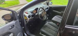 Red Mazda 2 2009 in Vilnius, with an engine capacity of 1.35 L and mileage of 320 thousand km for 499 €, photo 10 on AUTOMOTO.COM.LV