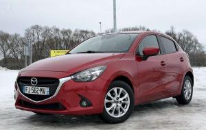 Red Mazda 2 2016 in Taurage, with an engine capacity of 1.50 L and mileage of 185 thousand km for 4600 €, photo  on AUTOMOTO.COM.LV