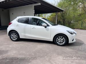 Белый Мазда 2 2015 в Таллин, объемом двигателя 1.50 л и пробегом 117 тыс. км за 8500 €, фото 5 на AUTOMOTO.COM.LV