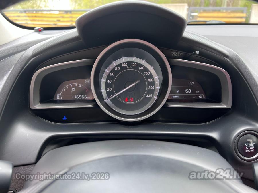 Белый Мазда 2 2015 в Таллин, объемом двигателя 1.50 л и пробегом 117 тыс. км за 8500 €, фото 15 на AUTOMOTO.COM.LV
