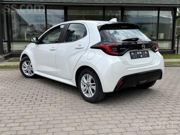 White Mazda 2 2025 in Tukums, with an engine capacity of 1.50 L and mileage of 32 thousand km for 17999 €, photo 2 on AUTOMOTO.COM.LV