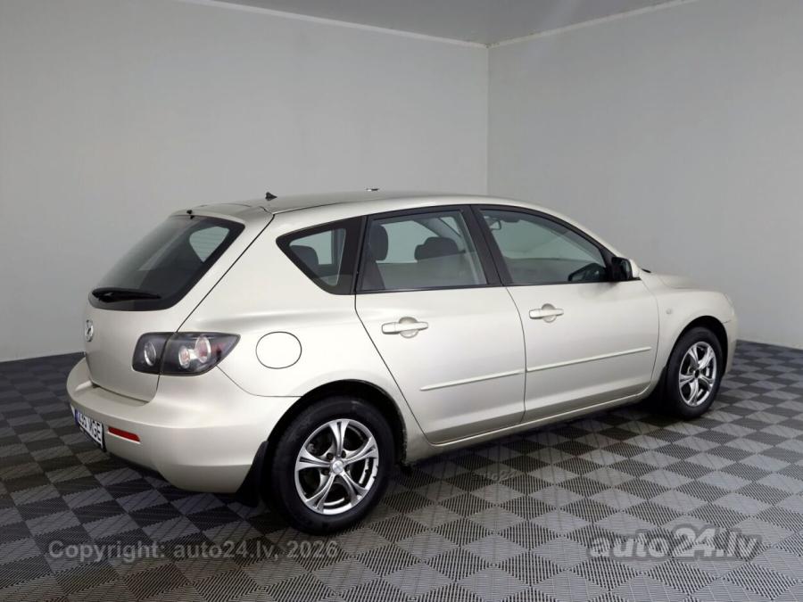 Beige Mazda 3 2006 in Tallinn, with an engine capacity of 1.60 L and mileage of 92 thousand km for 1399 €, photo 4 on AUTOMOTO.COM.LV