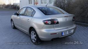 Beige Mazda 3 2006 in Tallinn, with an engine capacity of 1.60 L and mileage of 256 thousand km for 1199 €, photo 5 on AUTOMOTO.COM.LV