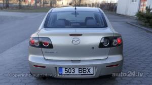 Beige Mazda 3 2006 in Tallinn, with an engine capacity of 1.60 L and mileage of 256 thousand km for 1199 €, photo 6 on AUTOMOTO.COM.LV