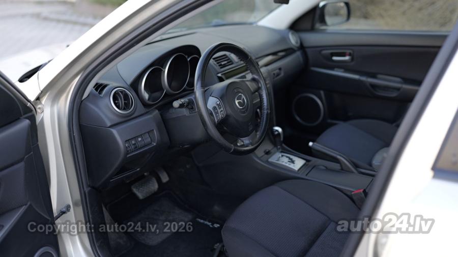 Beige Mazda 3 2006 in Tallinn, with an engine capacity of 1.60 L and mileage of 256 thousand km for 1199 €, photo 8 on AUTOMOTO.COM.LV