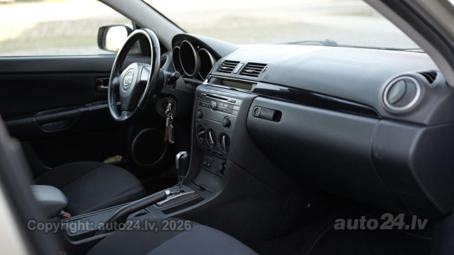 Beige Mazda 3 2006 in Tallinn, with an engine capacity of 1.60 L and mileage of 256 thousand km for 1199 €, photo 10 on AUTOMOTO.COM.LV