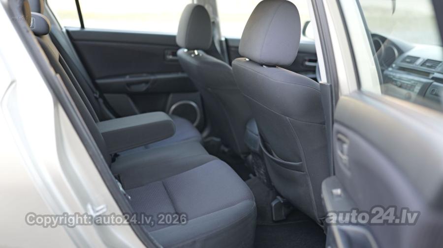Beige Mazda 3 2006 in Tallinn, with an engine capacity of 1.60 L and mileage of 256 thousand km for 1199 €, photo 12 on AUTOMOTO.COM.LV