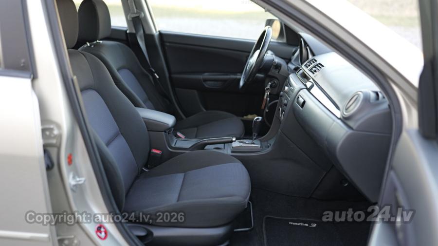 Beige Mazda 3 2006 in Tallinn, with an engine capacity of 1.60 L and mileage of 256 thousand km for 1199 €, photo 13 on AUTOMOTO.COM.LV