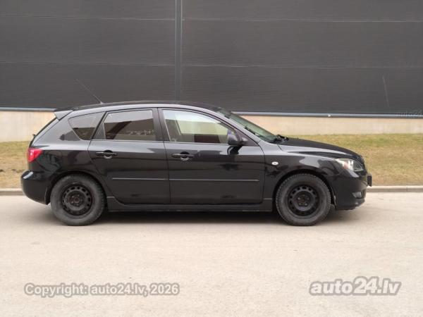 Black Mazda 3 2004 in Tallinn, with an engine capacity of 1.60 L and mileage of 260 thousand km for 999 €, photo 6 on AUTOMOTO.COM.LV