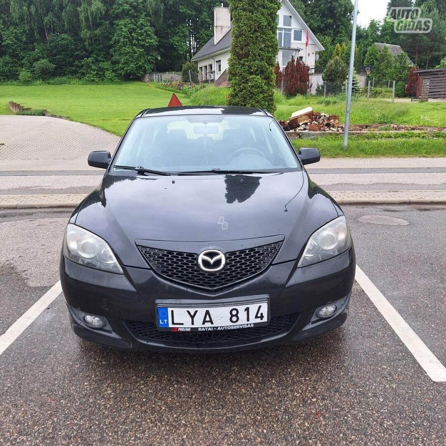 Black Mazda 3 2005 in Utena, with an engine capacity of 1.60 L and mileage of 216 thousand km for 1400 €, photo 3 on AUTOMOTO.COM.LV