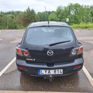 Black Mazda 3 2005 in Utena, with an engine capacity of 1.60 L and mileage of 216 thousand km for 1400 €, photo 6 on AUTOMOTO.COM.LV