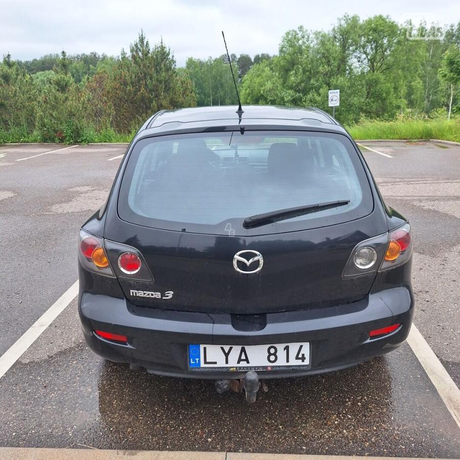 Black Mazda 3 2005 in Utena, with an engine capacity of 1.60 L and mileage of 216 thousand km for 1400 €, photo 6 on AUTOMOTO.COM.LV