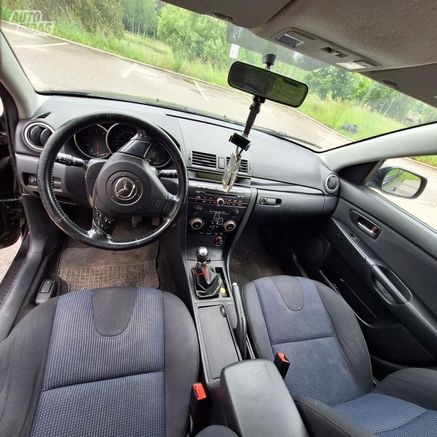 Black Mazda 3 2005 in Utena, with an engine capacity of 1.60 L and mileage of 216 thousand km for 1400 €, photo 8 on AUTOMOTO.COM.LV