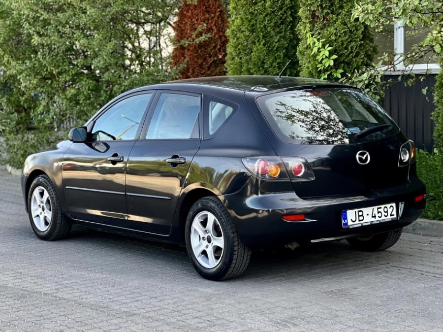 Black Mazda 3 2005 in Riga, with an engine capacity of 1.60 L and mileage of 291 thousand km for 1650 €, photo 3 on AUTOMOTO.COM.LV