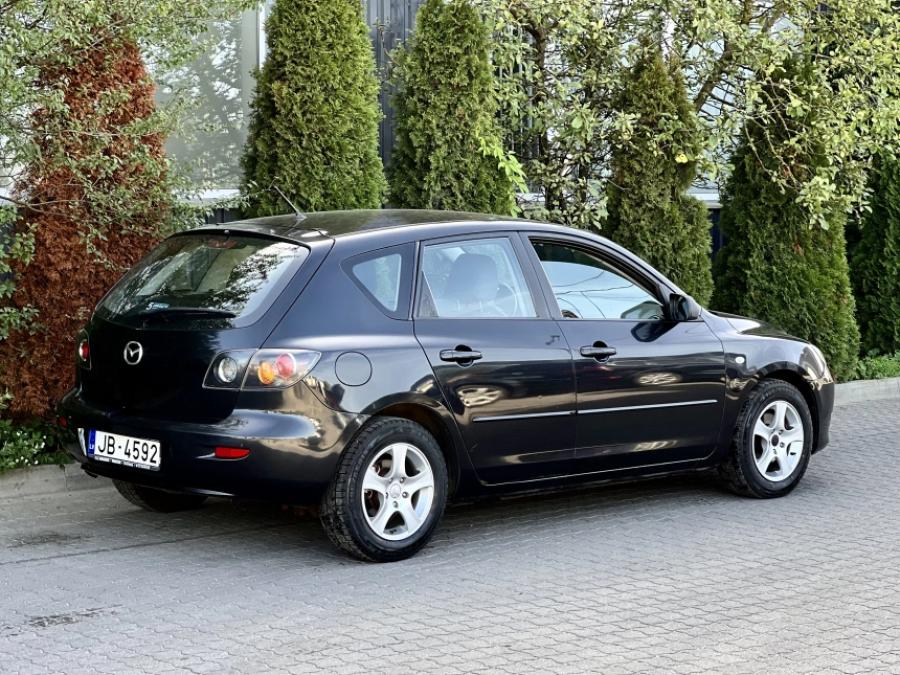 Black Mazda 3 2005 in Riga, with an engine capacity of 1.60 L and mileage of 291 thousand km for 1650 €, photo 4 on AUTOMOTO.COM.LV