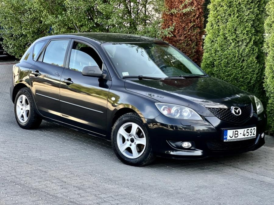 Black Mazda 3 2005 in Riga, with an engine capacity of 1.60 L and mileage of 291 thousand km for 1650 €, photo 5 on AUTOMOTO.COM.LV